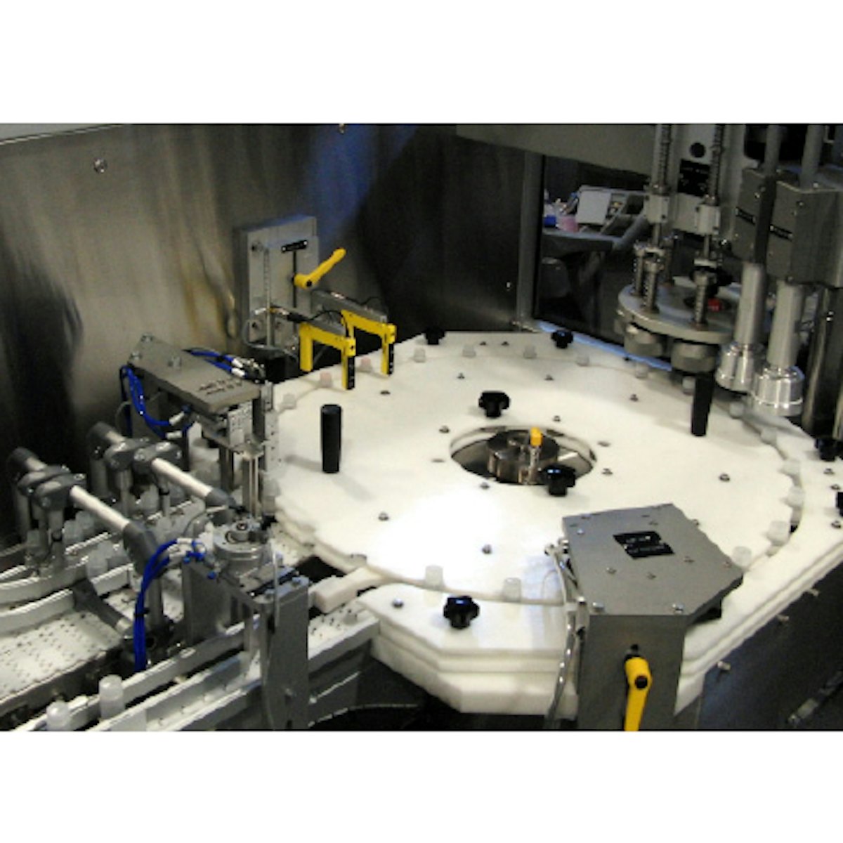ESS Technologies: Filler/capper with integrated net weigh system From ...