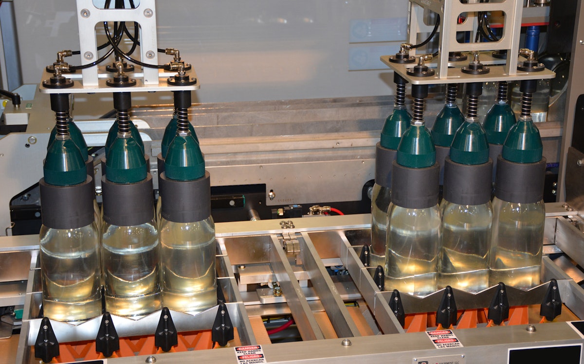 Douglas: Top load case packer for wine, beer, and spirits From: Douglas ...