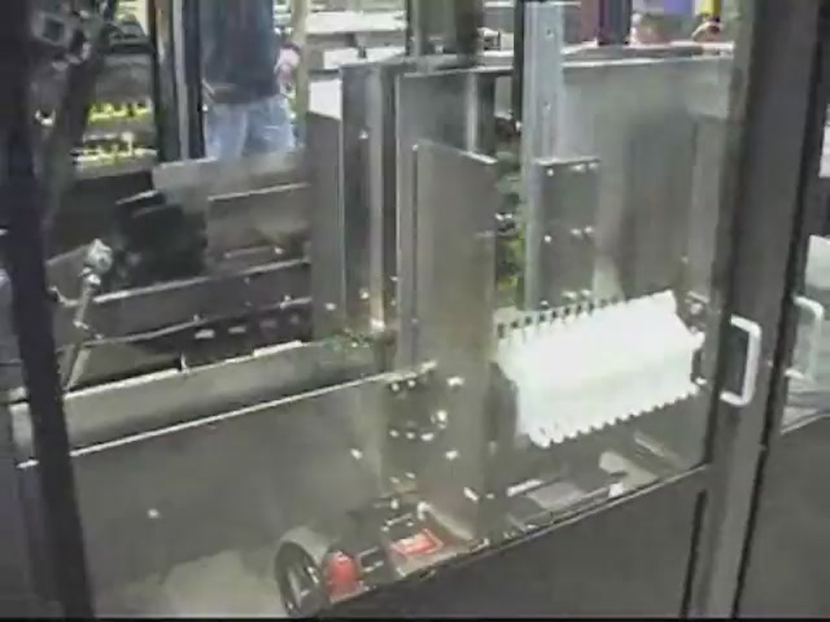 Case packer with rotary upstacker infeed for cartoned multipacks ...