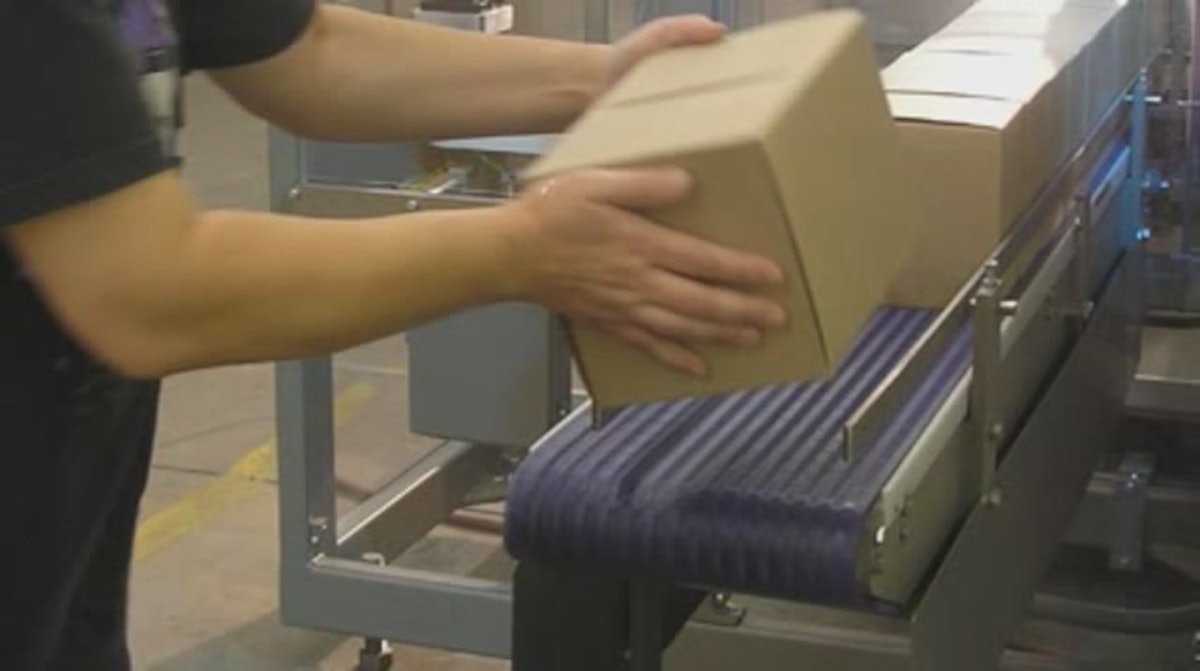 Douglas 'low speed' case/tray packer is high on performance | Packaging ...